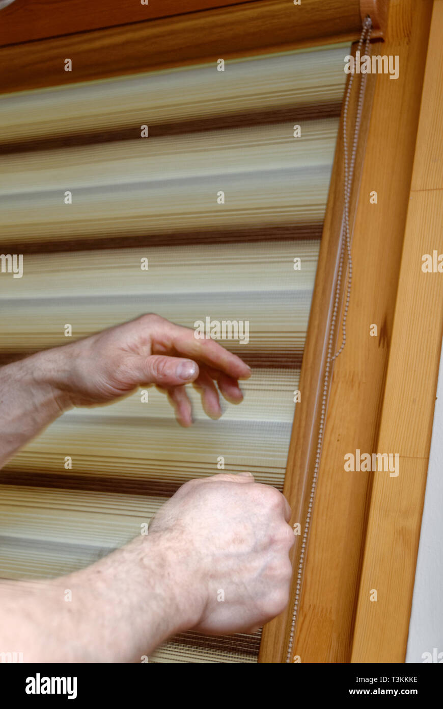 Window blinds installation Stock Photo - Alamy
