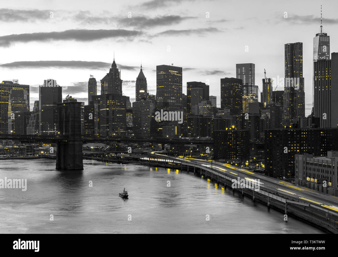 New York City yellow night lights shining on black and white skyline ...