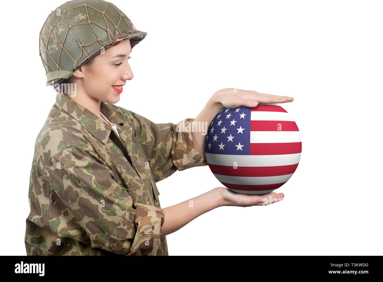 a pretty young woman in ww2 uniform us showing sphere of American flag ...