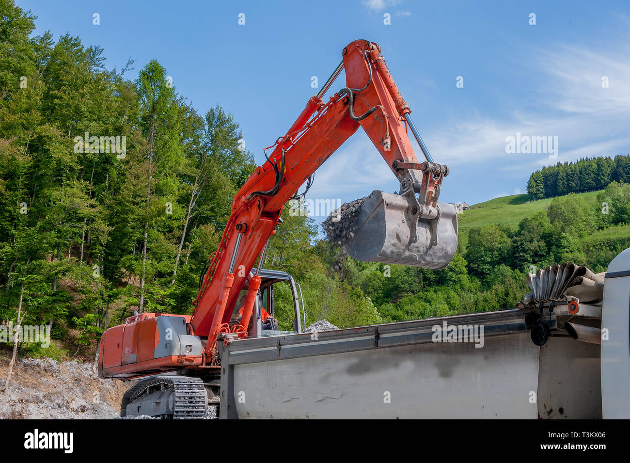 load of gravel with bulldozer in construction site Stock Photo - Alamy
