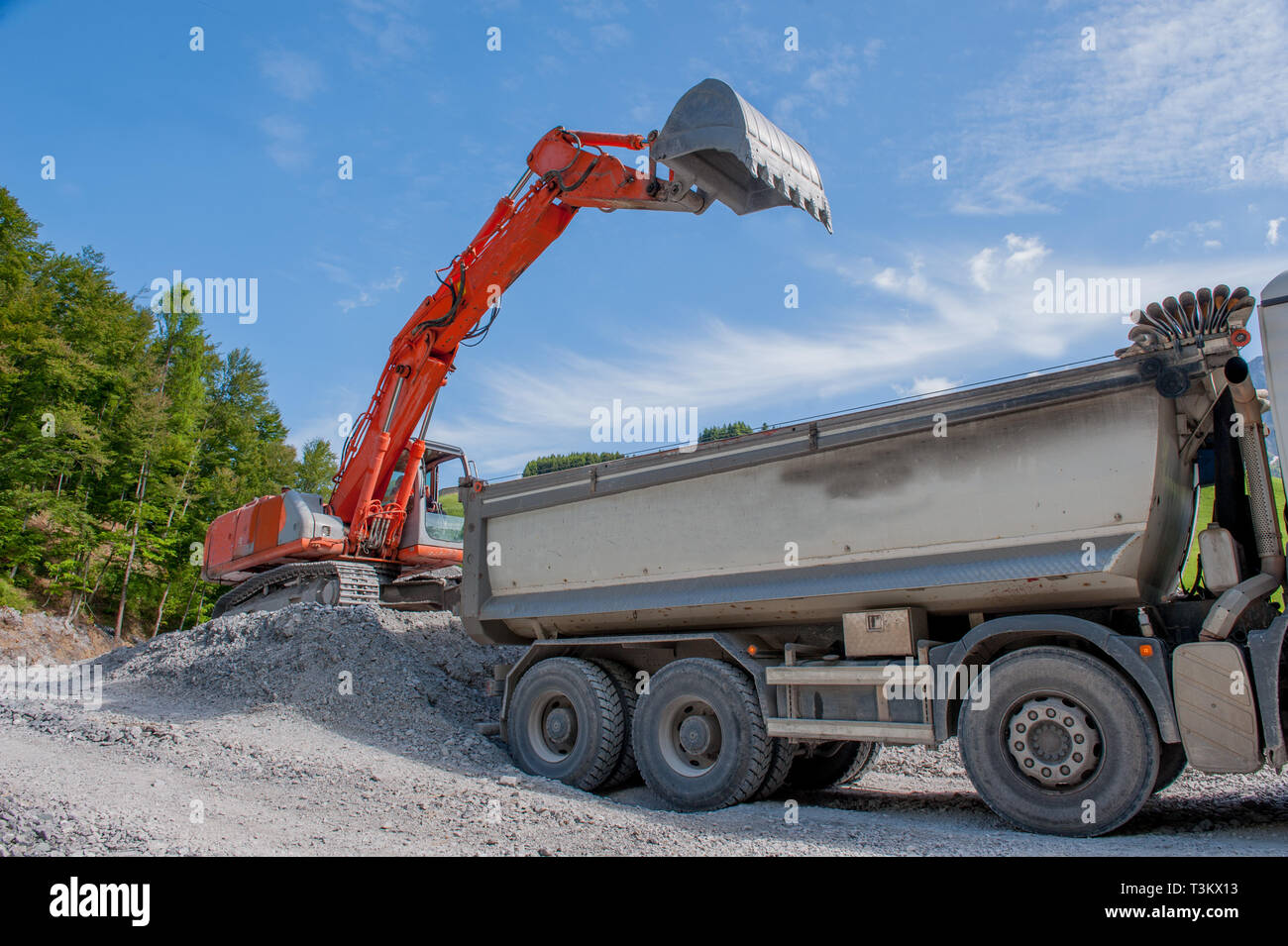 load of gravel with bulldozer in construction site Stock Photo - Alamy