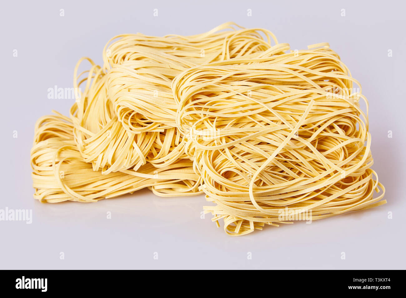 Curly noodles hi-res stock photography and images - Alamy