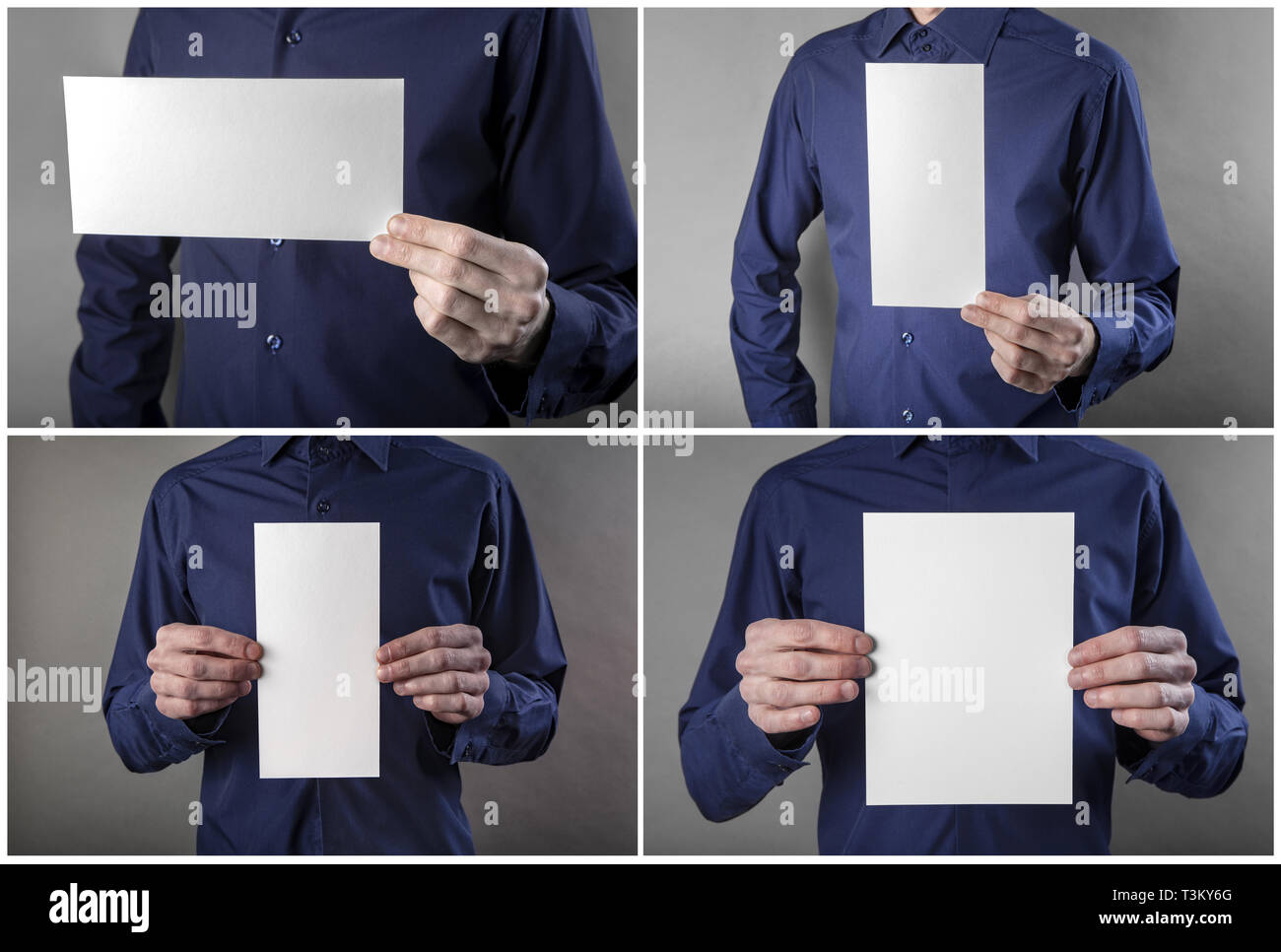 A man in a blue shirt holding a white flyer Stock Photo - Alamy