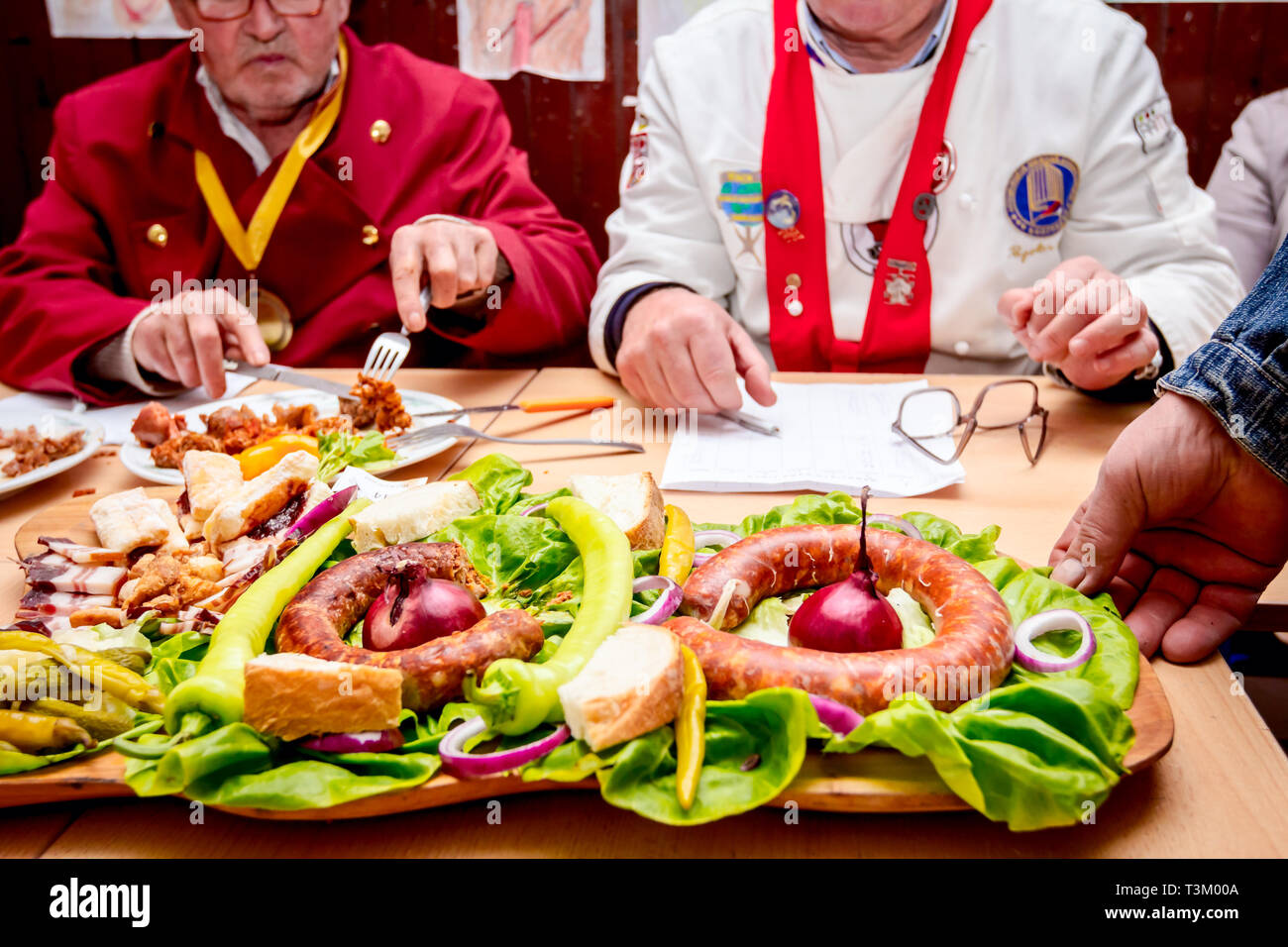 Traditional sausages are arranged for review at food contest Stock ...
