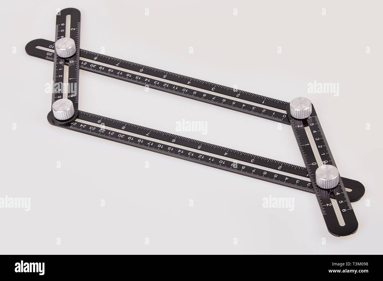 Black multi function Ruler isolated on white background. Ultimate ...