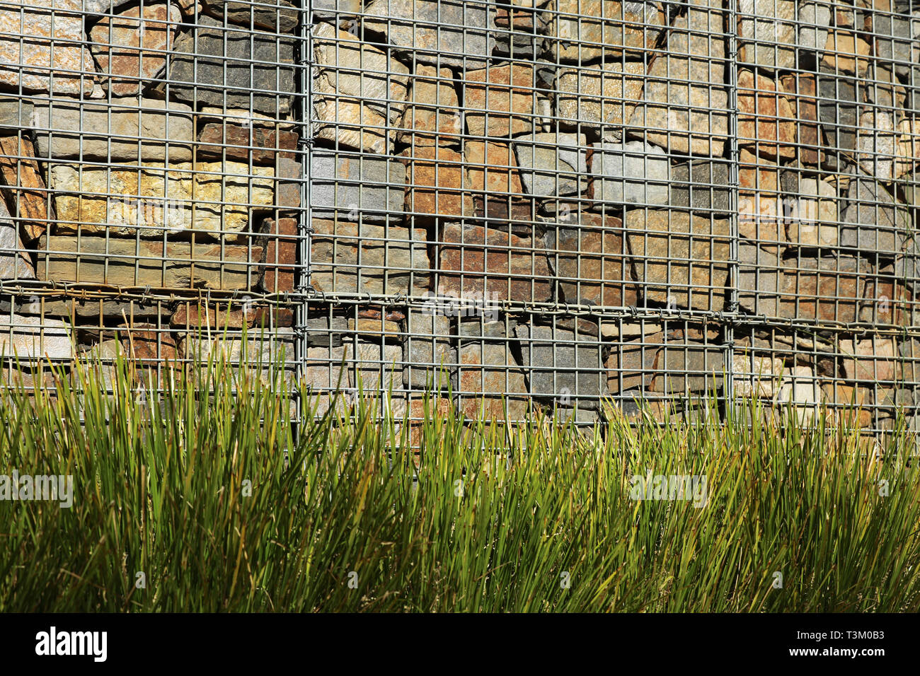 Gabion Fence with stones Stock Photo - Alamy