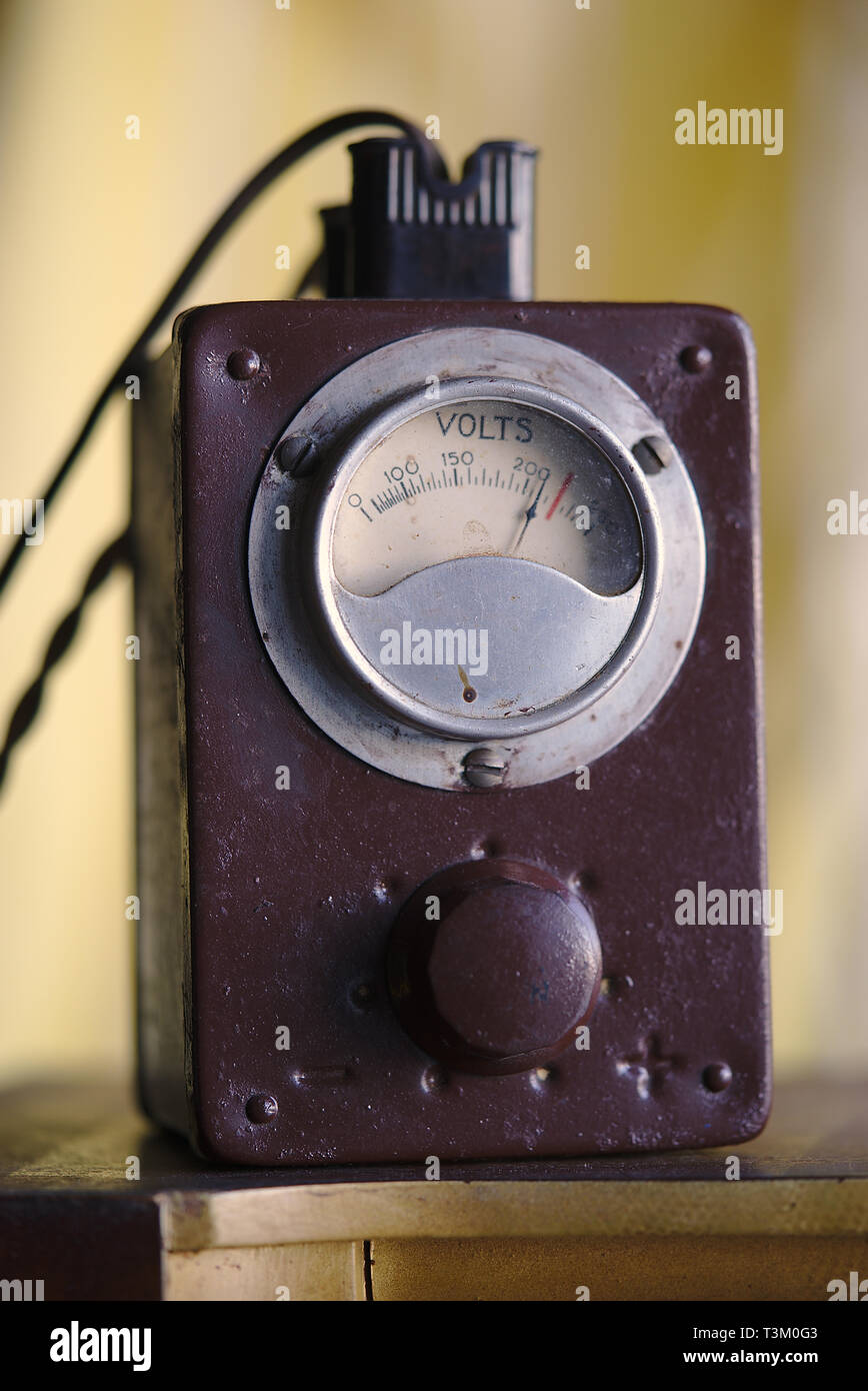 vintage power supply, with voltage indicator dial in action Stock Photo ...