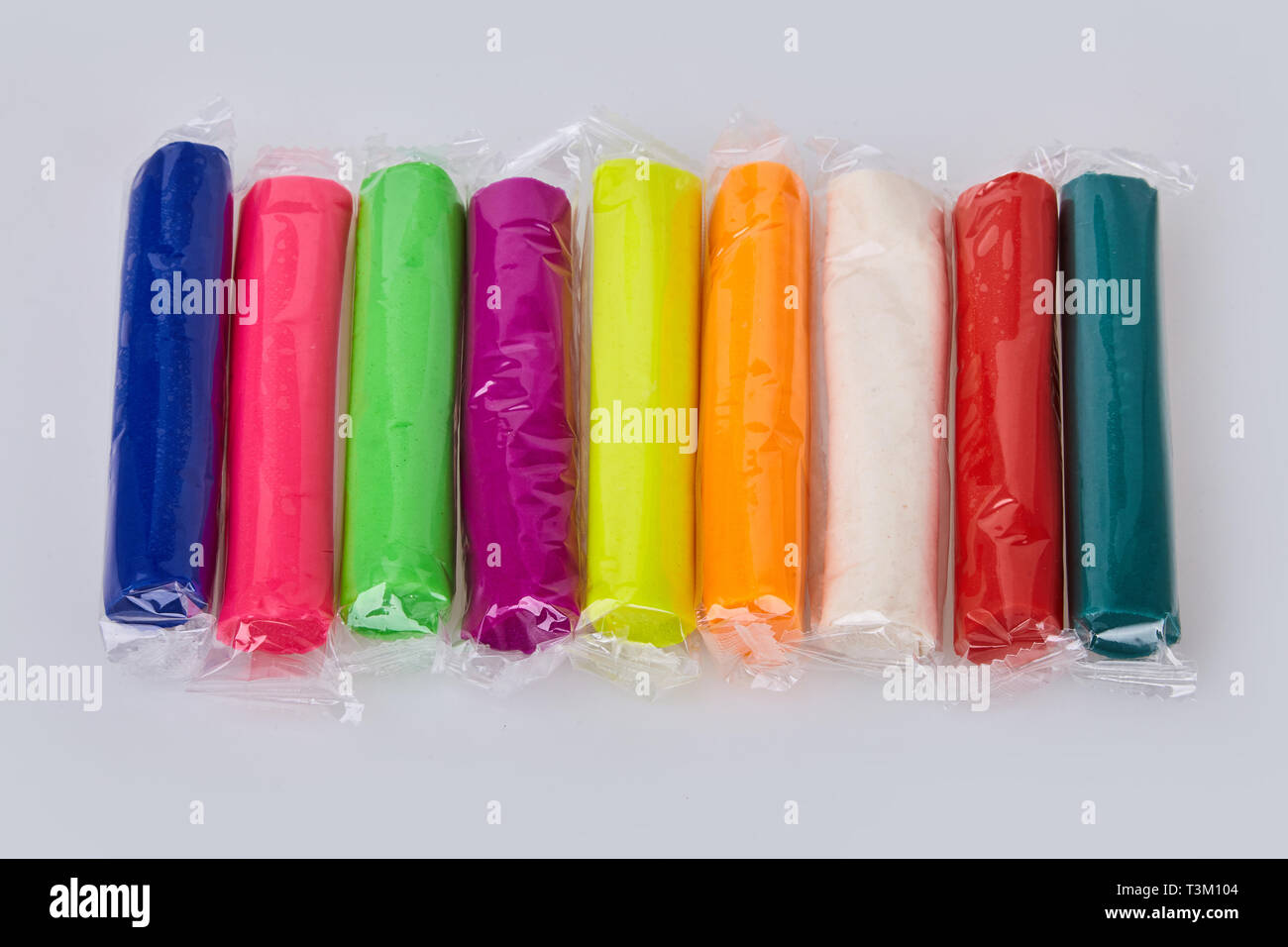 Set of colorful plasticine isolated on a white background. Plasticine ...