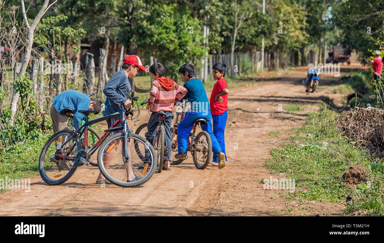 Colonia Independencia, Paraguay - August 15, 2018: Five little guys ...