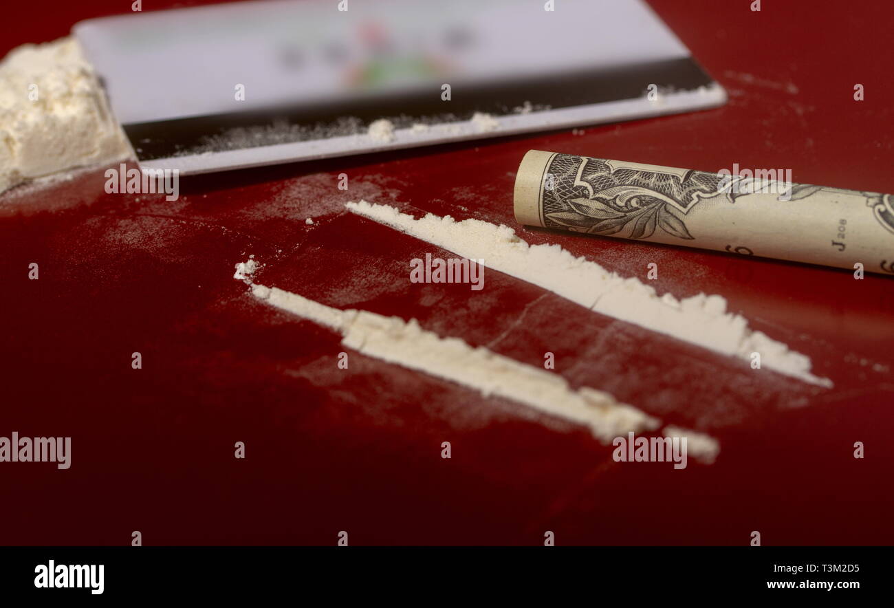 cocaine on a red table Stock Photo - Alamy