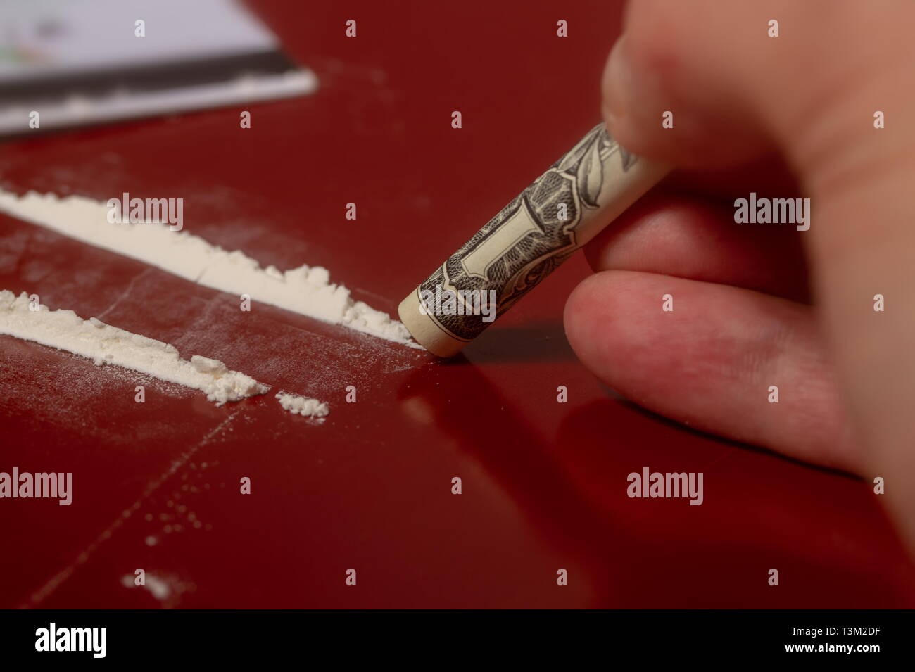 cocaine on a red table Stock Photo - Alamy