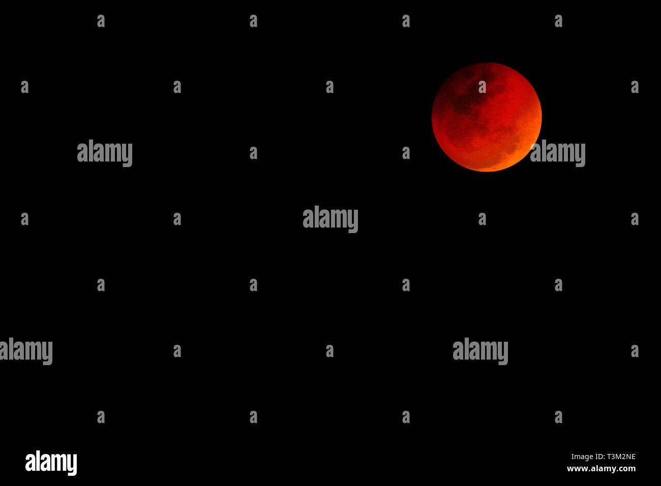 Big red moon with negative space for text, black background Stock Photo ...