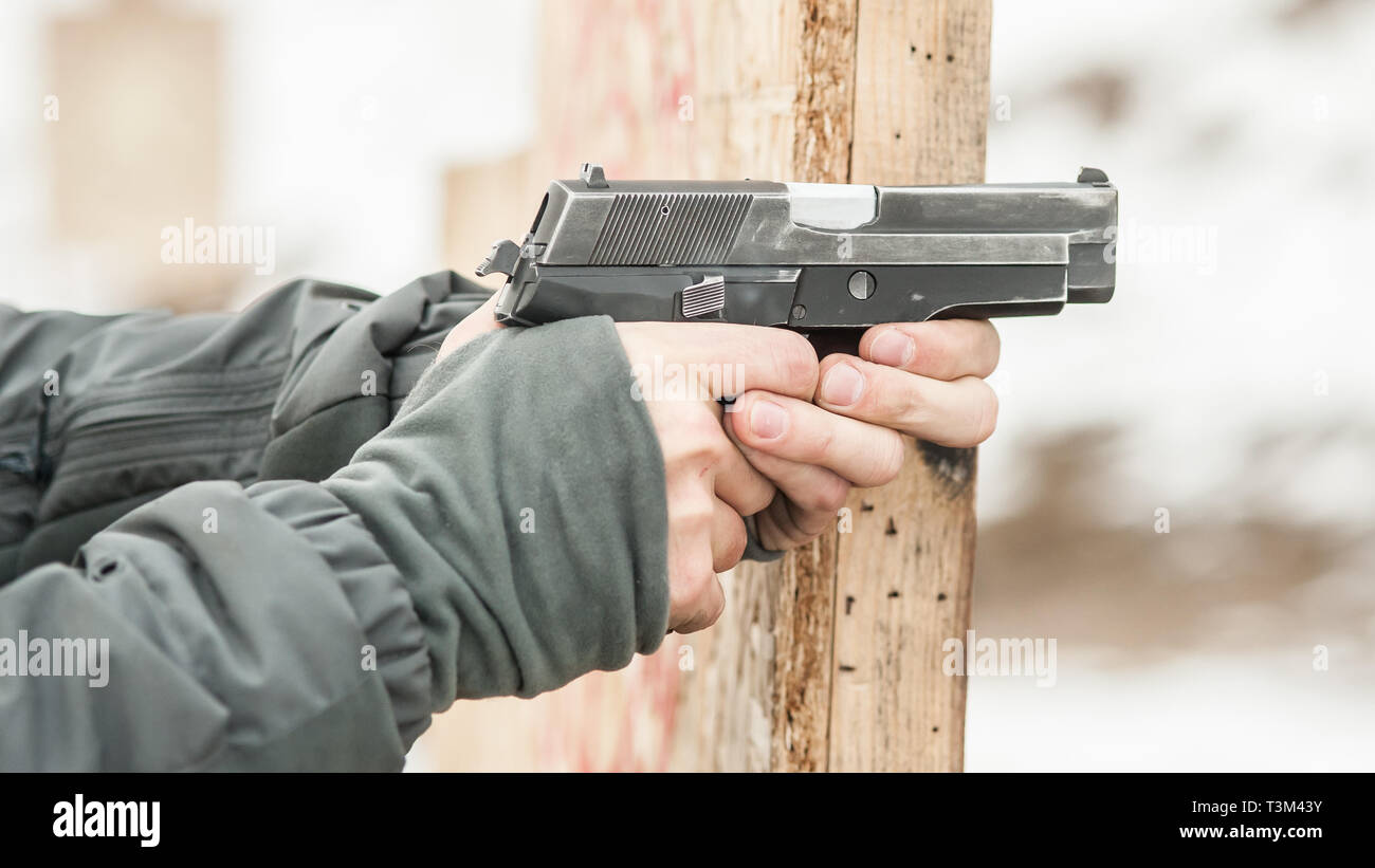 Man handle the gun hi-res stock photography and images - Alamy
