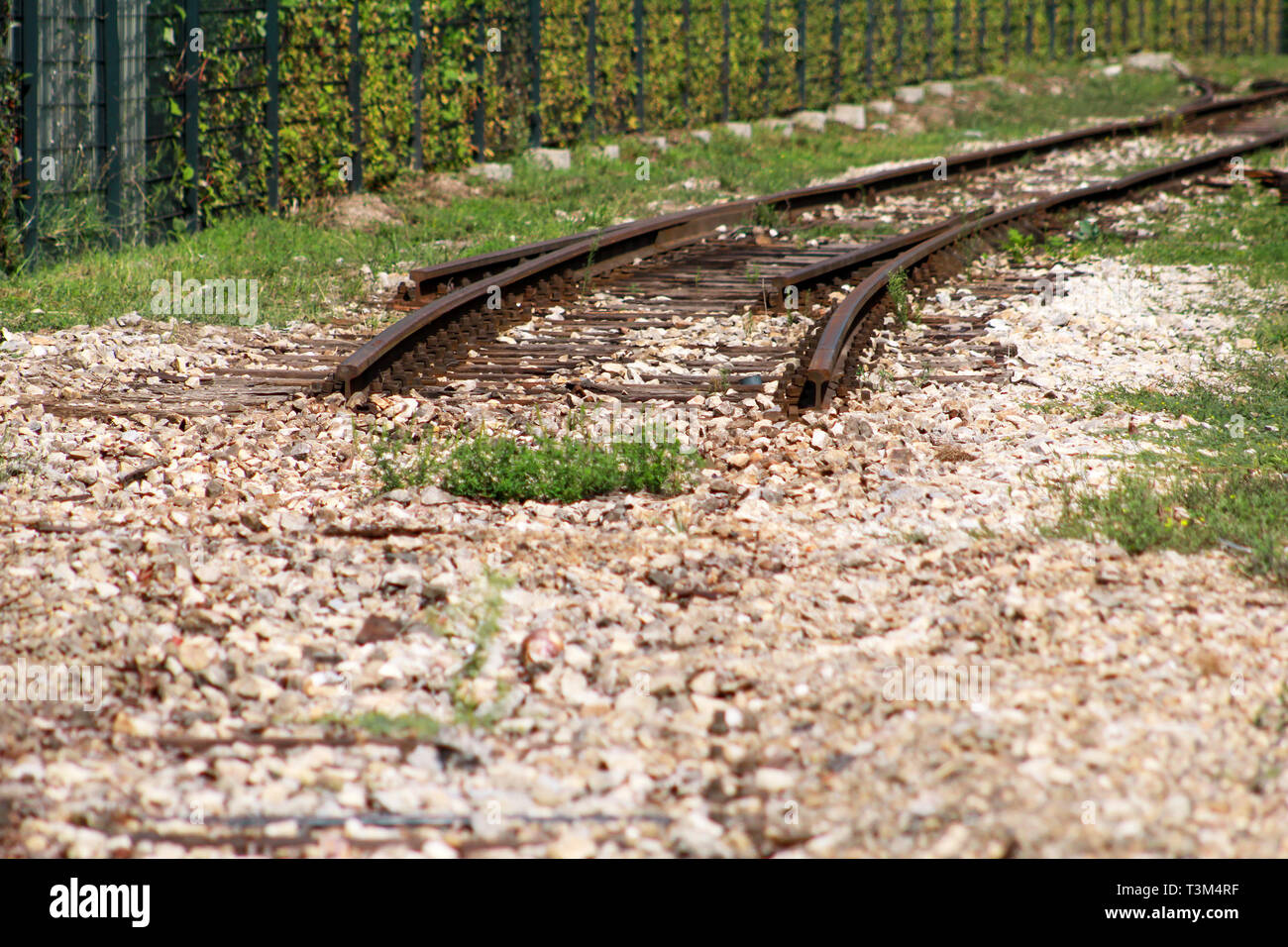 Old railway track in urban city. Vintage railroad. Close view of old ...