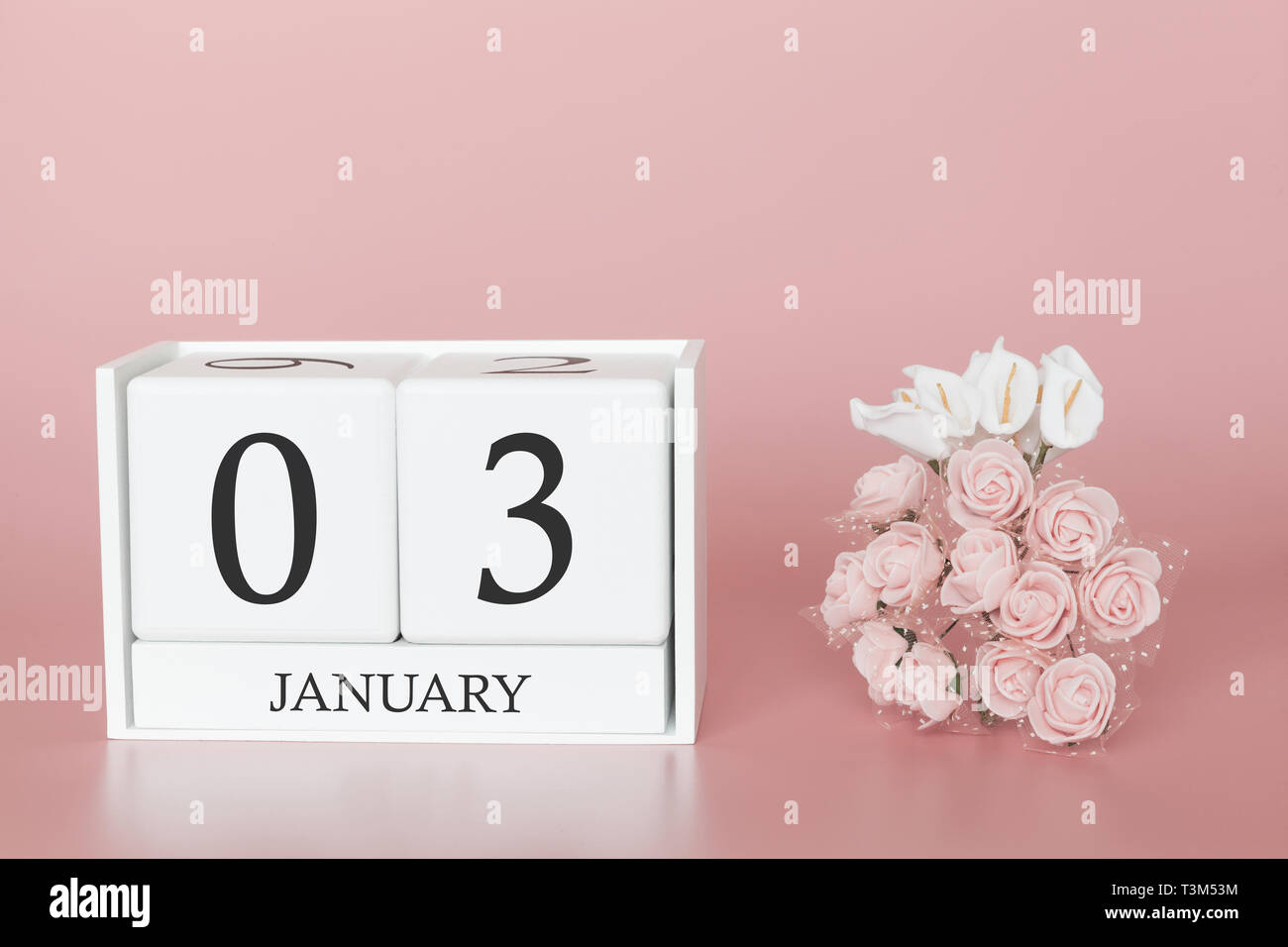 January 03rd. Day 3 of month. Calendar cube on modern pink background ...