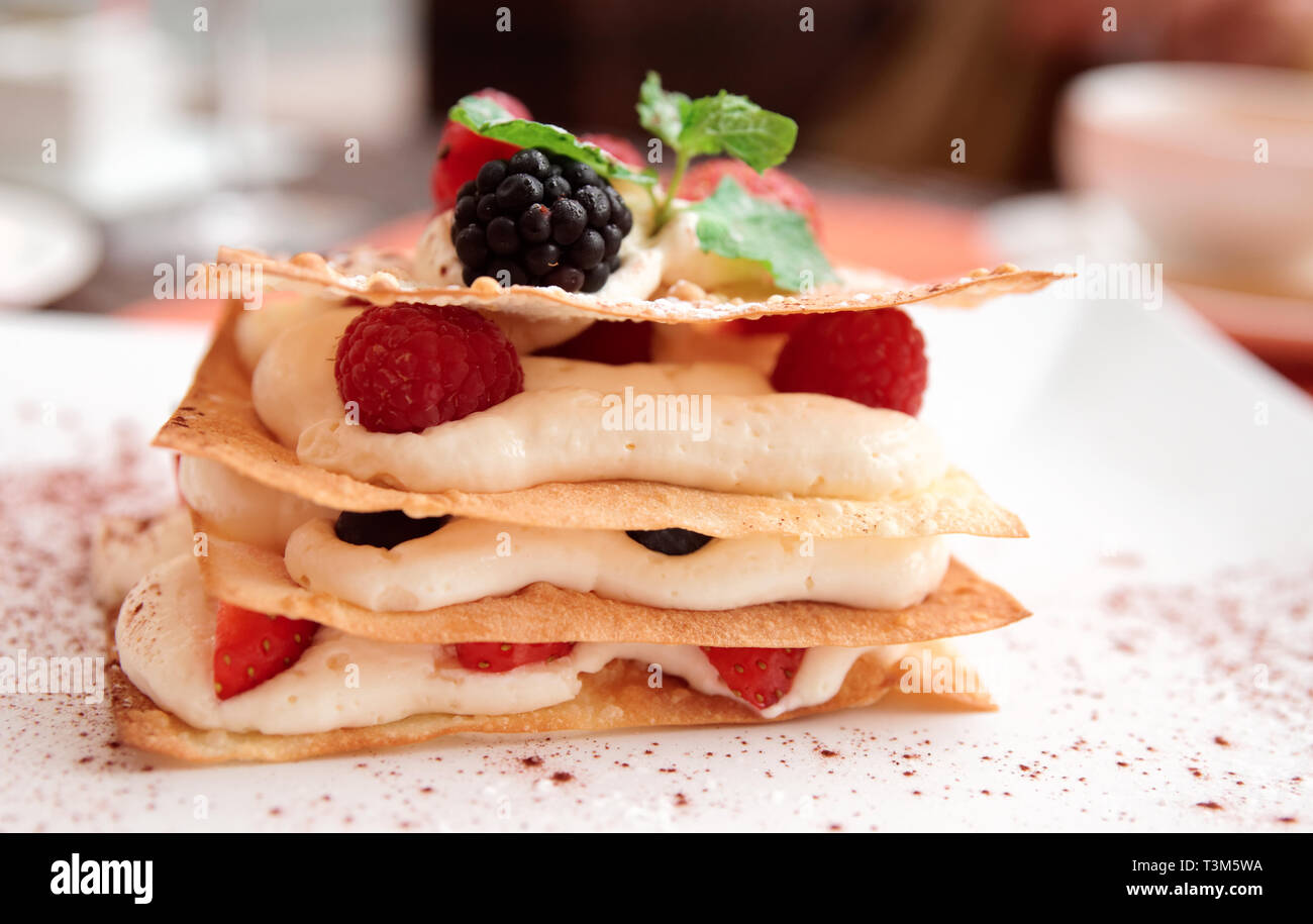 Mille-feuille cake with raspberries and sweet cream Stock Photo - Alamy