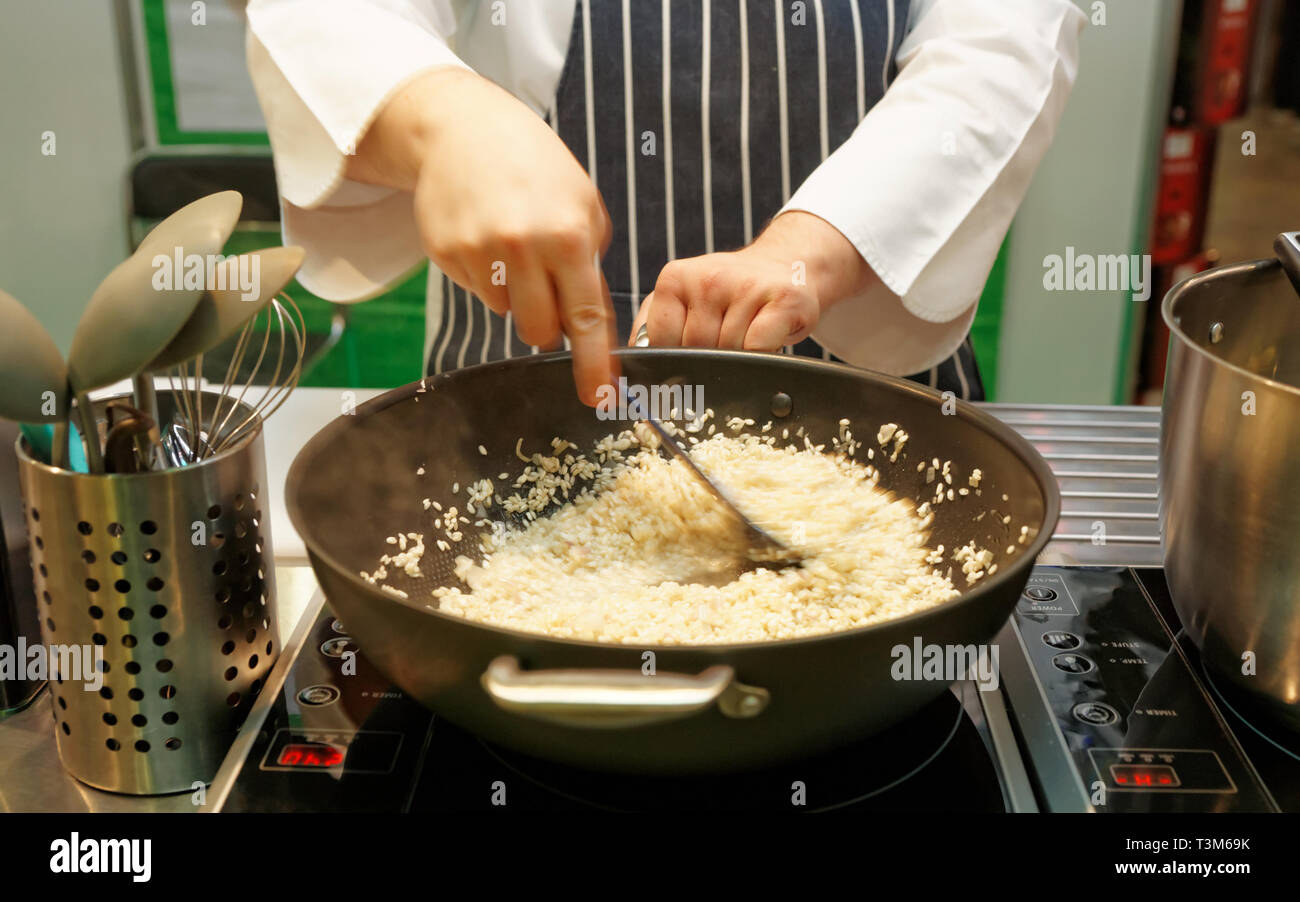 Hand stirring food hi-res stock photography and images - Alamy