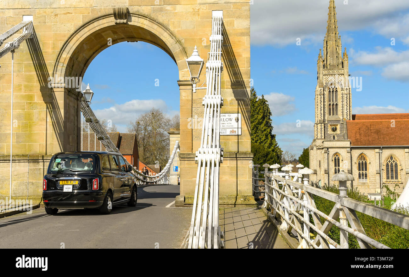 MARLOW, ENGLAND - MARCH 2019: Black London cab crossing the bridge ...