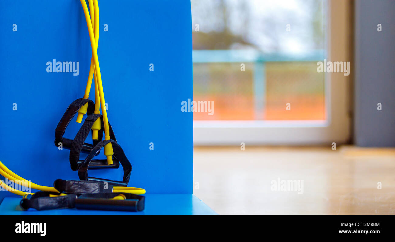 sports gum for aerobics on the background of the blue mat Stock Photo ...