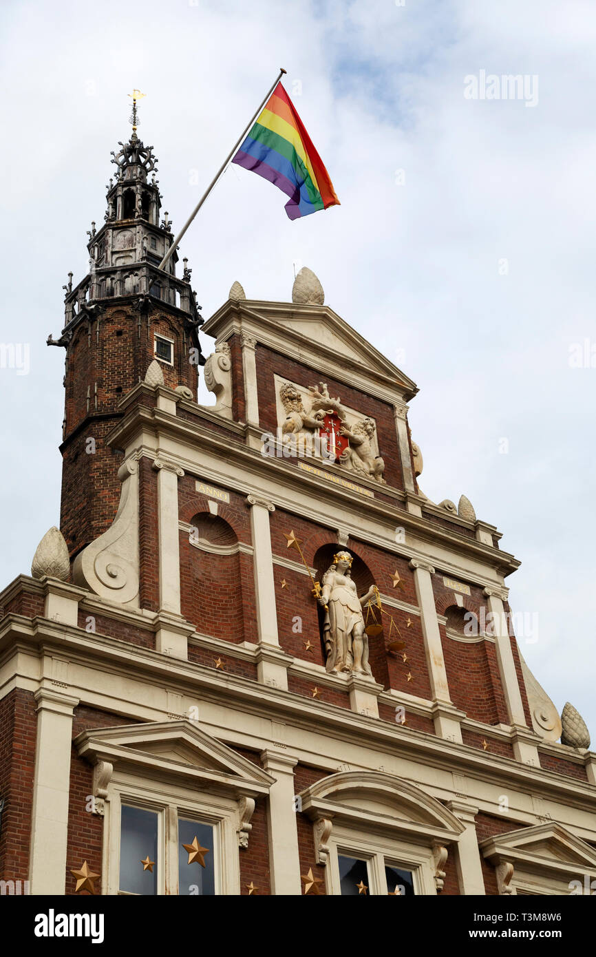 The rainbow flag of the LBGTQ Movement flies above the city hall in ...