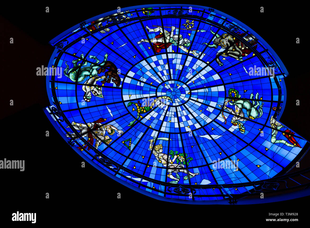 Signs of the zodiac on a glass ceiling in Haarlem, the Netherlands. The ...