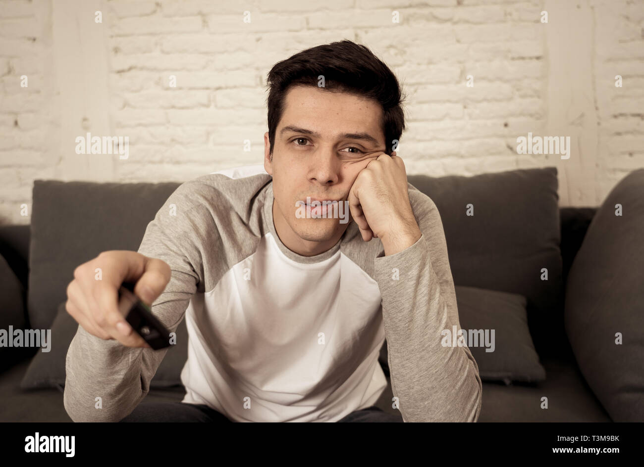 Man drinking alone sofa hi-res stock photography and images - Alamy