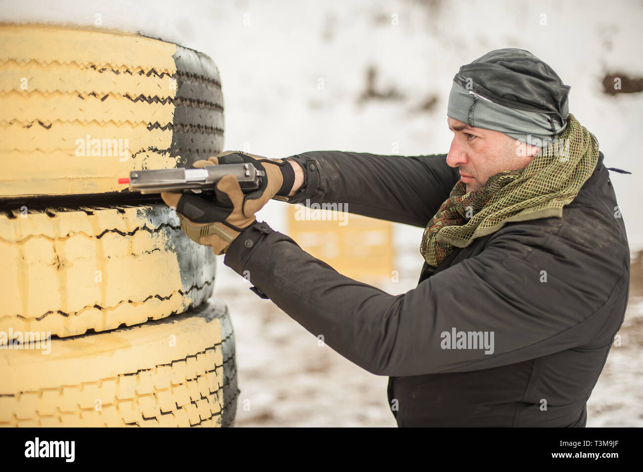 Man holding gun from behind hi-res stock photography and images - Alamy