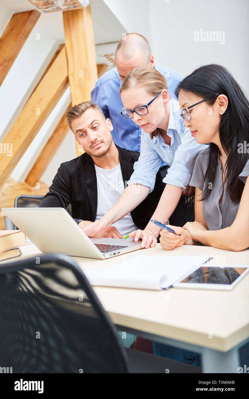 Software developer team at laptop Computer design new design for web ...