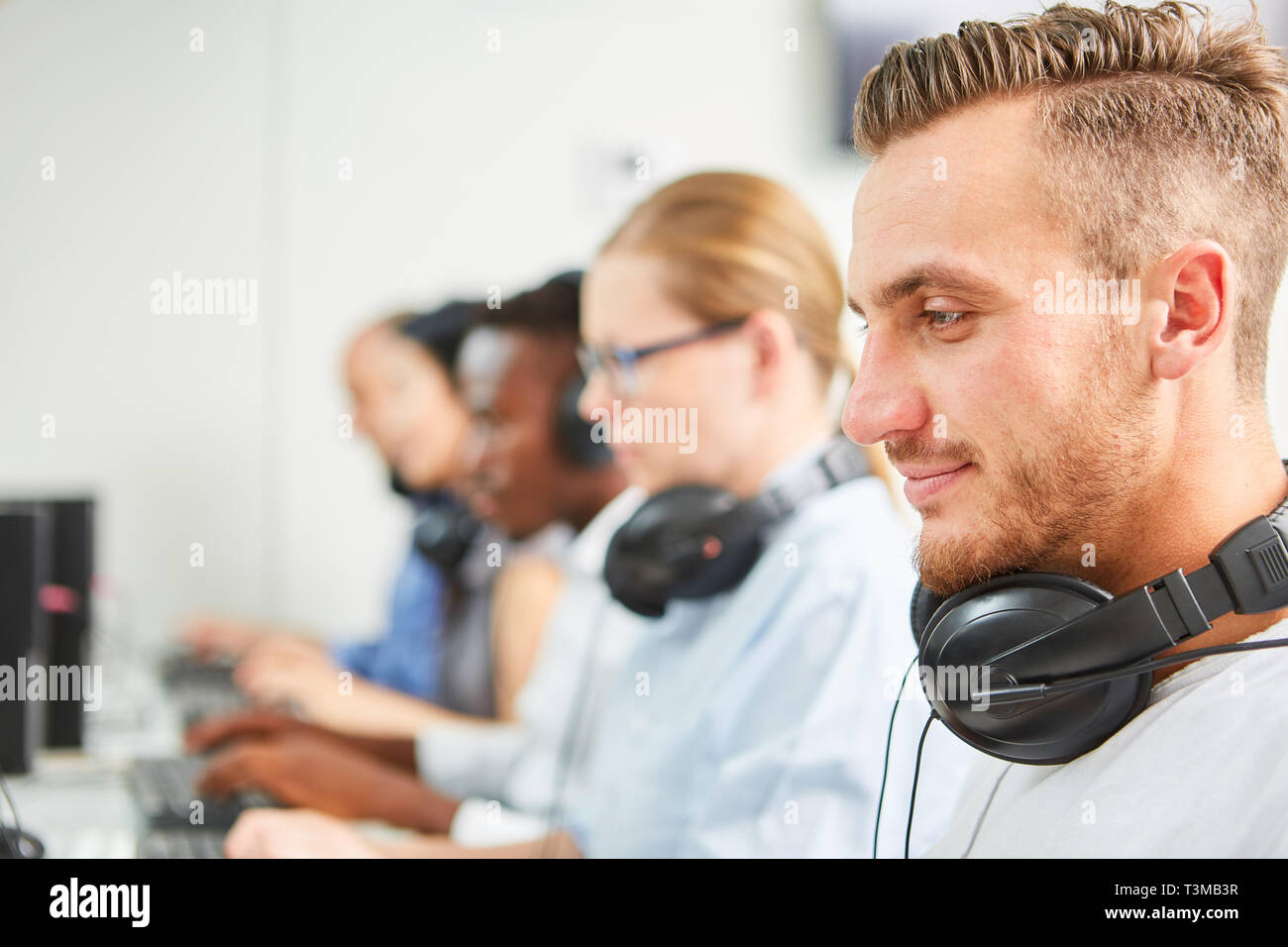 Computer science students in computer course while studying or ...