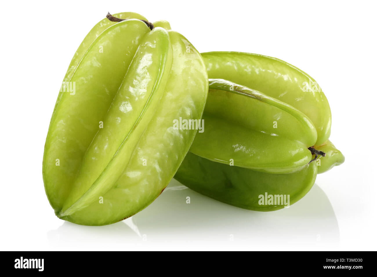 Fresh whole Star fruits isolated on white background Stock Photo - Alamy
