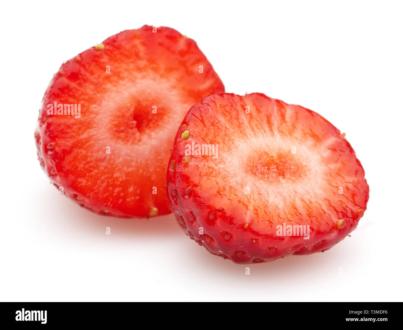 Half strawberries isolated on white background Stock Photo - Alamy