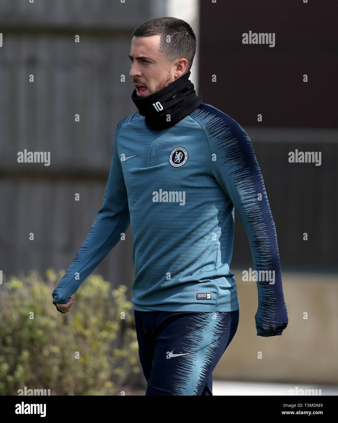 Chelsea's Eden Hazard walks out to the training session at Cobham ...