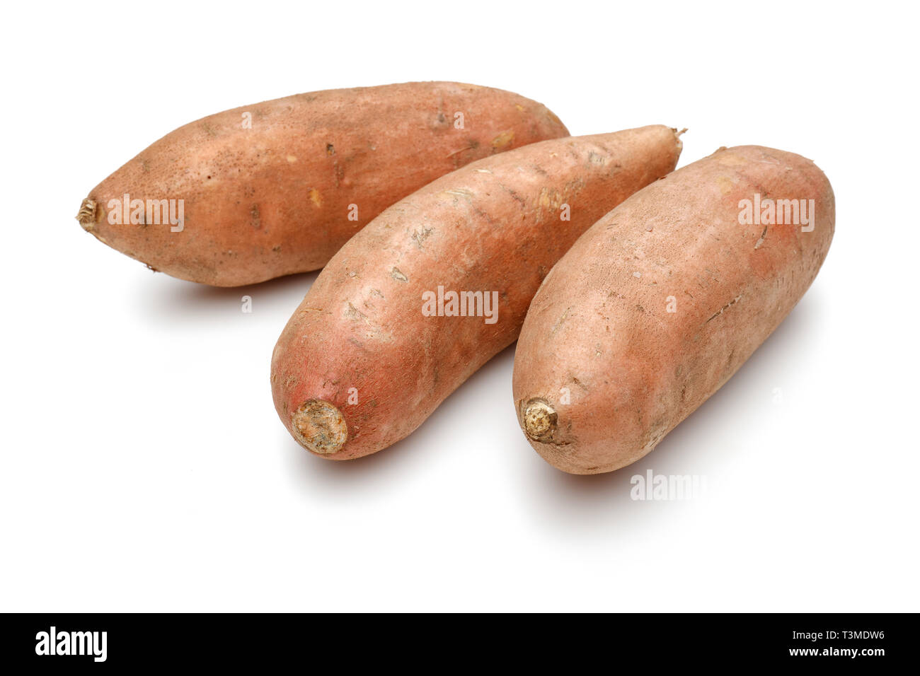 Group of whole sweet potatoes isolated on white background Stock Photo ...