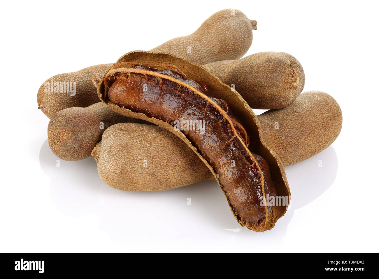 Fresh tamarind fruit isolated on white background Stock Photo - Alamy