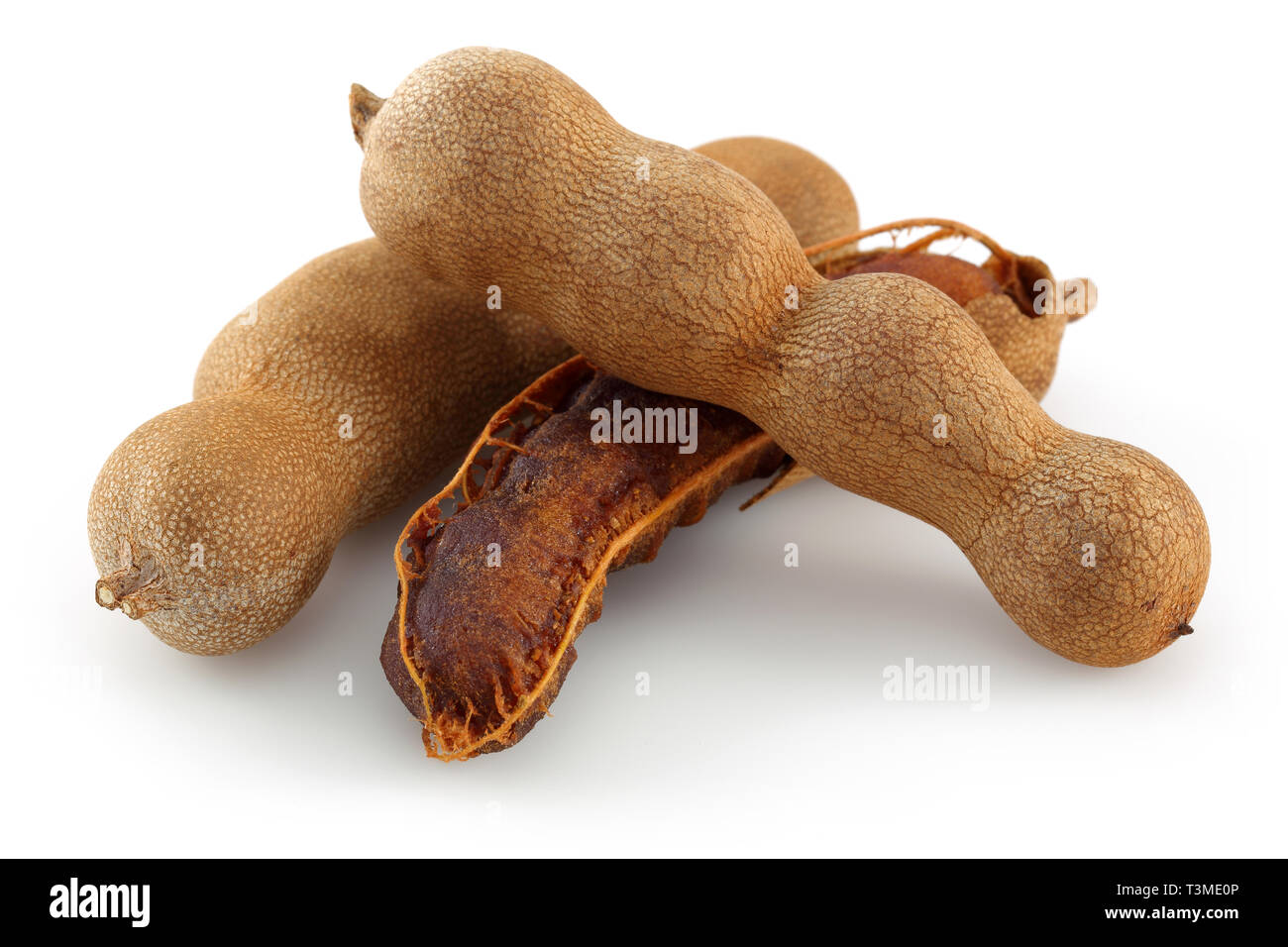Fresh tamarind fruit isolated on white background Stock Photo - Alamy