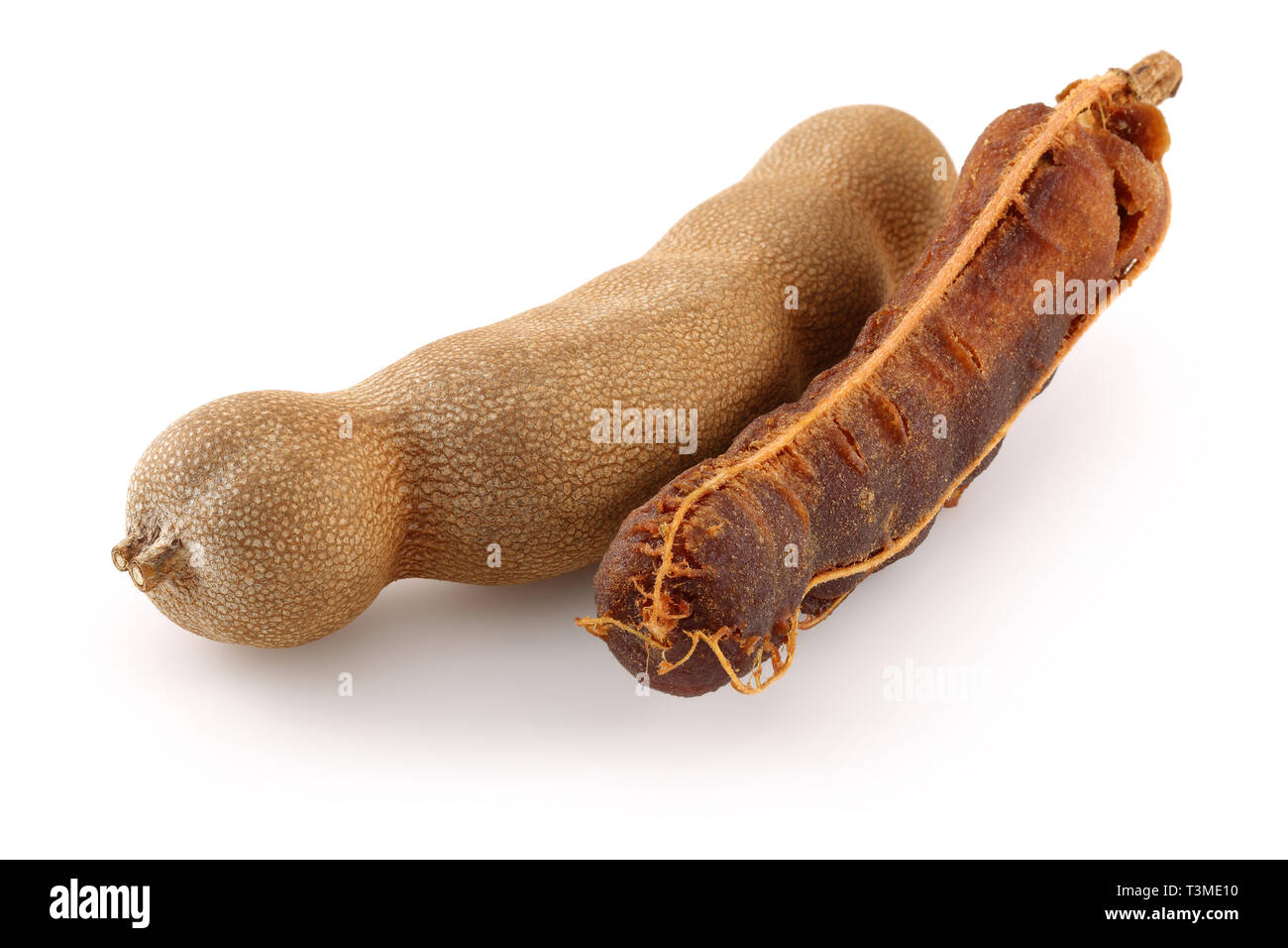 Fresh tamarind fruit isolated on white background Stock Photo - Alamy