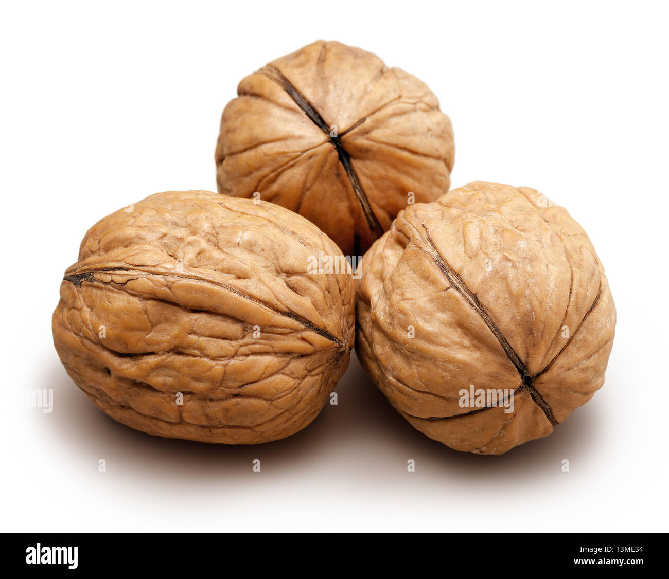 Whole walnuts isolated on white background Stock Photo - Alamy