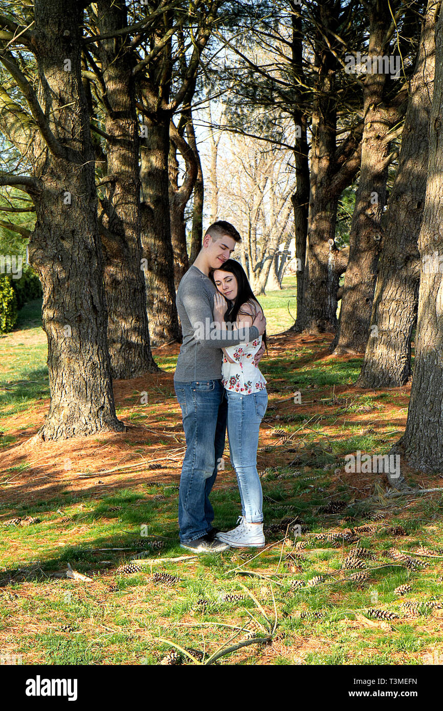 Newly engaged Caucasian couple lovingly sharing time together while ...