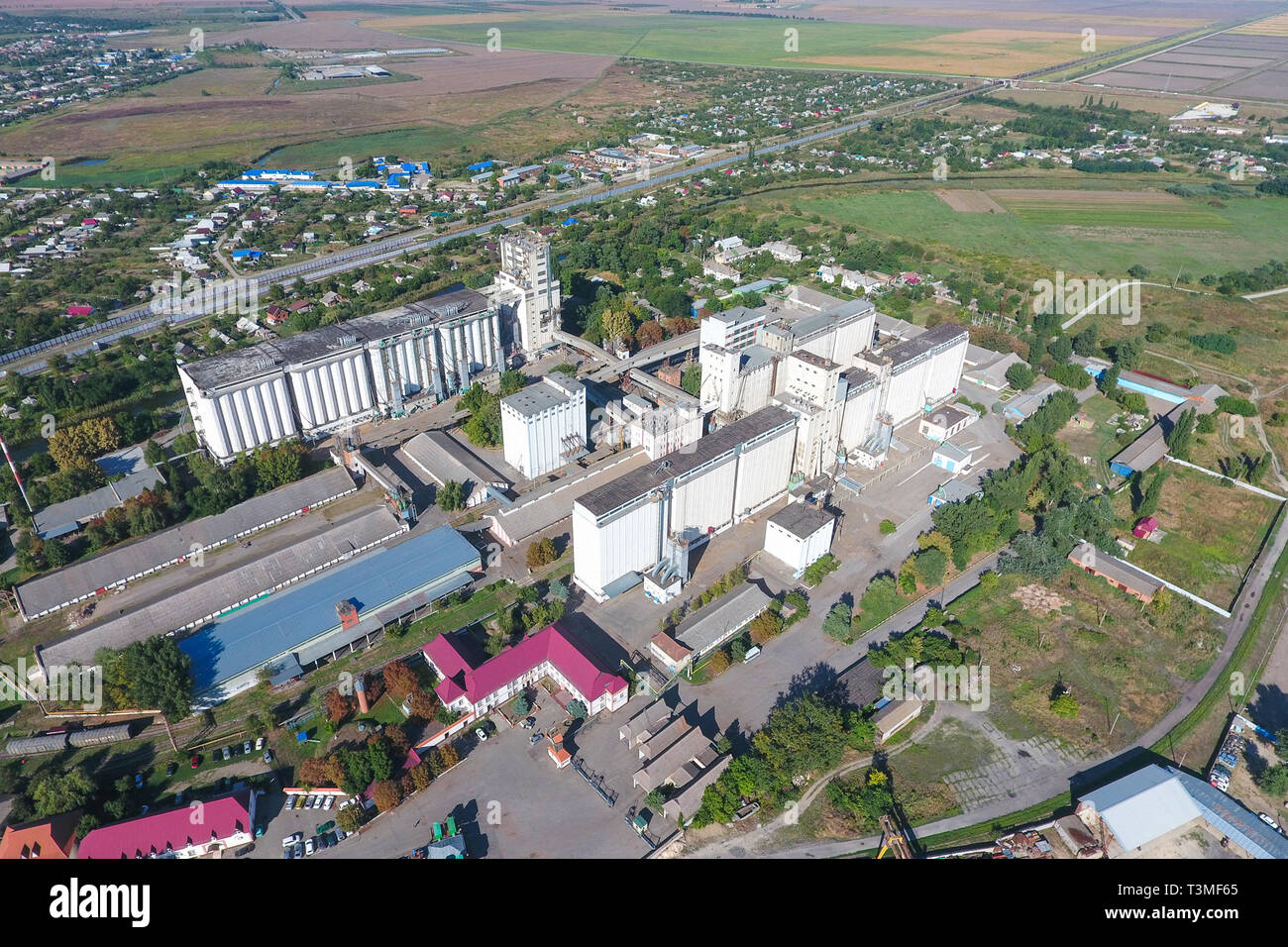 Top view of a silo elevator. The huge building for storing and drying ...