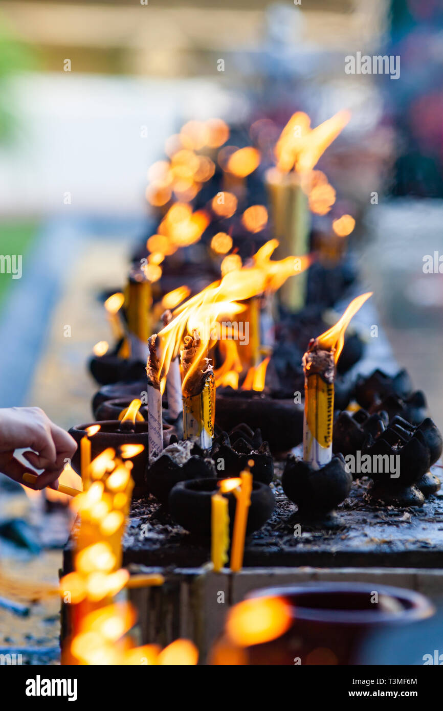 buddhist ceremony - burning candles Stock Photo - Alamy