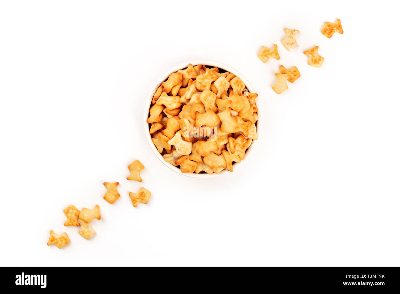 Salty goldfish crackers in a bowl, shot from the top on a white ...
