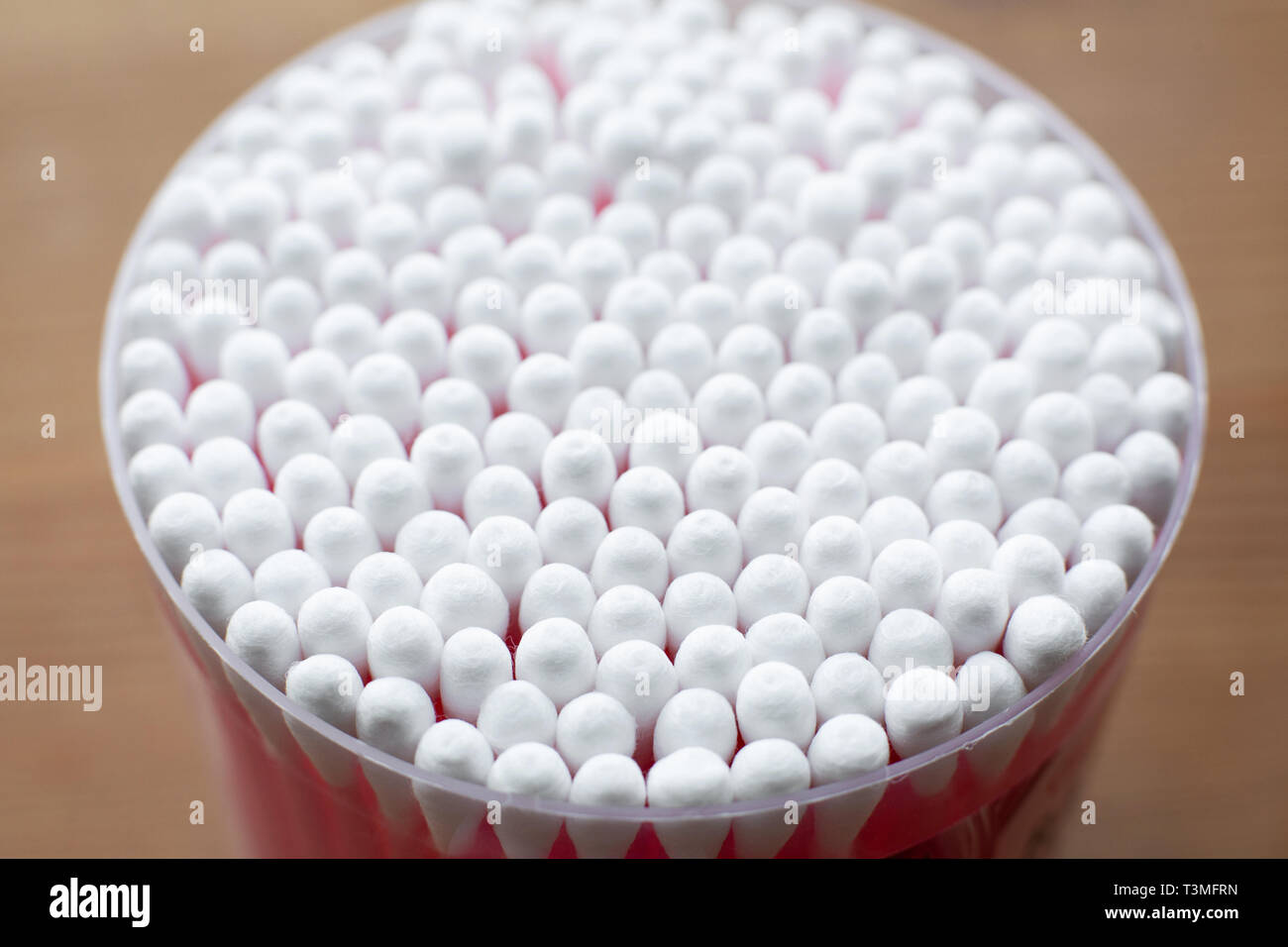 Closeup view from above on round pack of cotton buds Stock Photo - Alamy