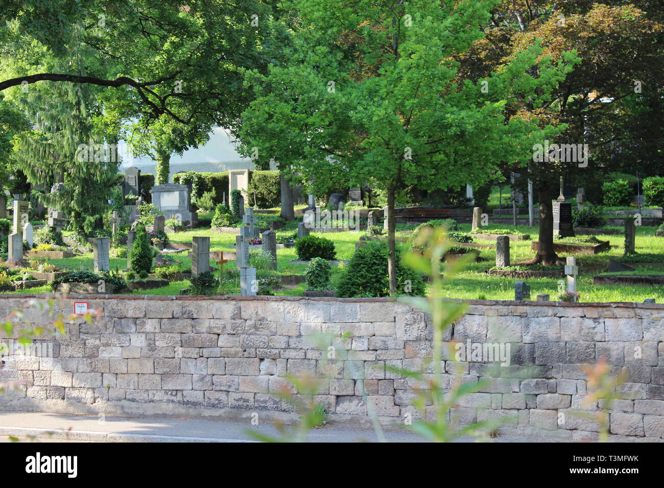 A peaceful graveyard in Germany Stock Photo - Alamy