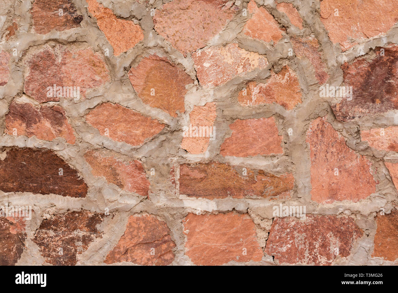red stone wall mountain texture and background Stock Photo - Alamy