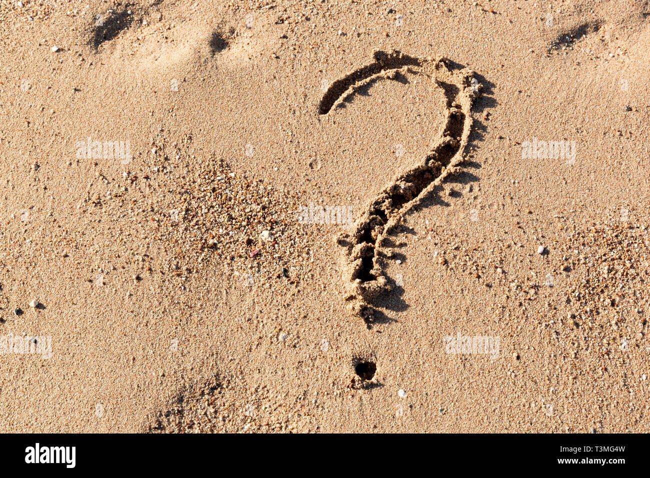 Question mark sign on sand beach near the sea. Concept of dilemma ...