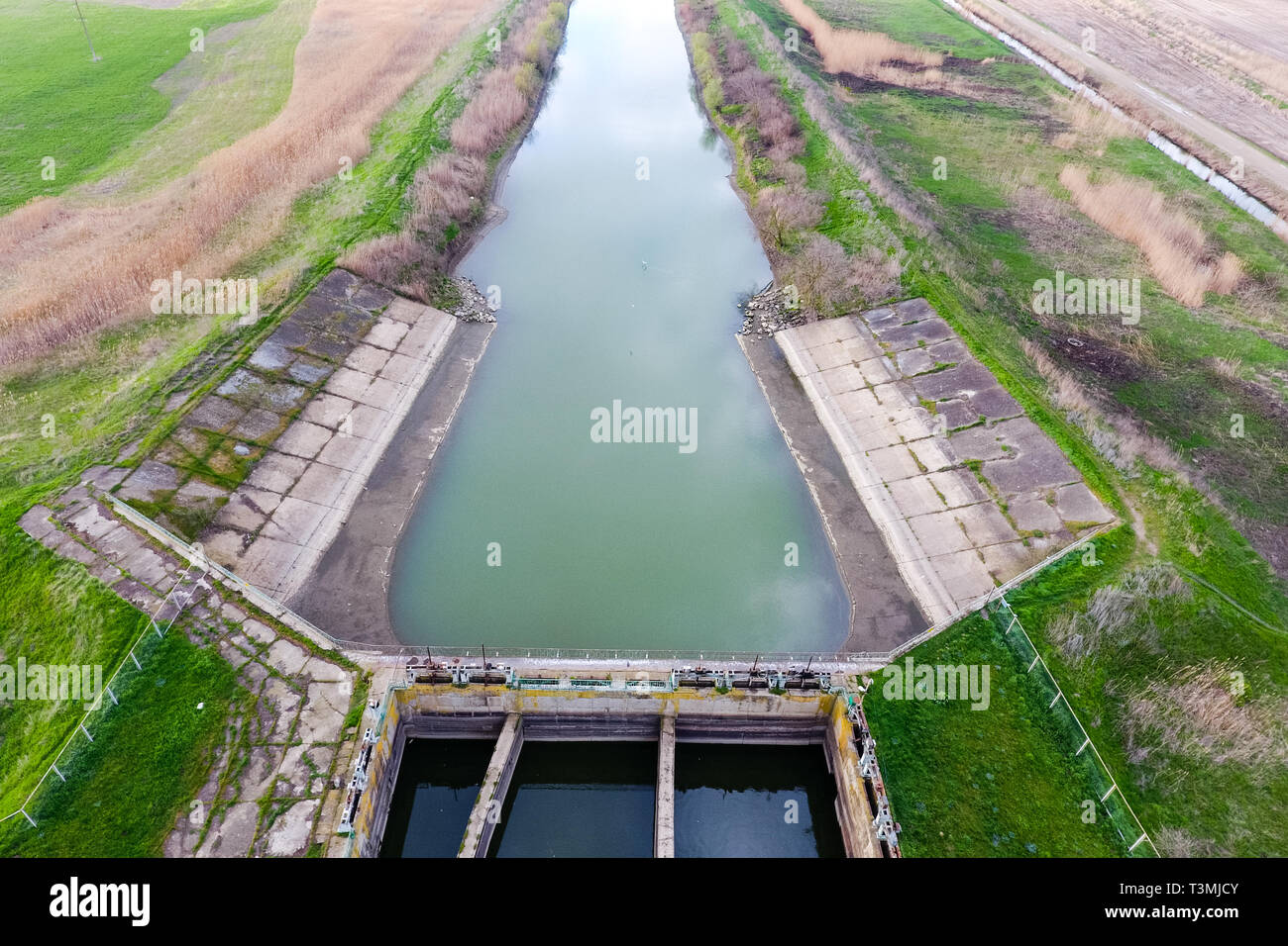 Water pumping station of irrigation system of rice fields. View from ...