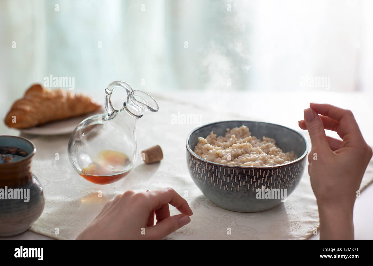 Hot cup of tea with cereal for breakfast hi-res stock photography and ...