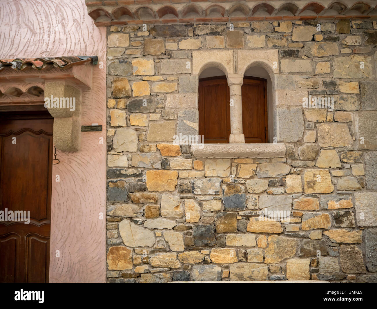 detail of medieval house window in small rural village in the French ...