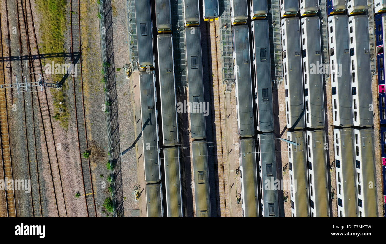 Aerial view over passenger trains in rows at a station Stock Photo - Alamy