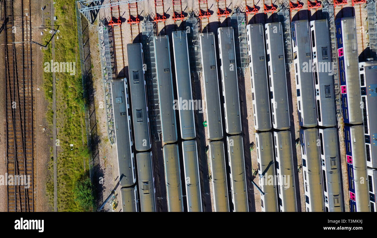 Aerial view over passenger trains in rows at a station Stock Photo - Alamy
